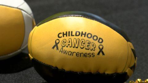 iJag students rally to raise awareness for childhood cancer with “Gold ...