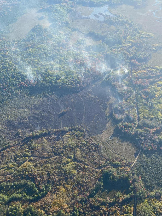 Firefighters working to contain 85-acre wildfire near Houghton Lake in ...