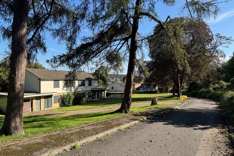 Leafy housing estate where homes have sat empty since 1990s