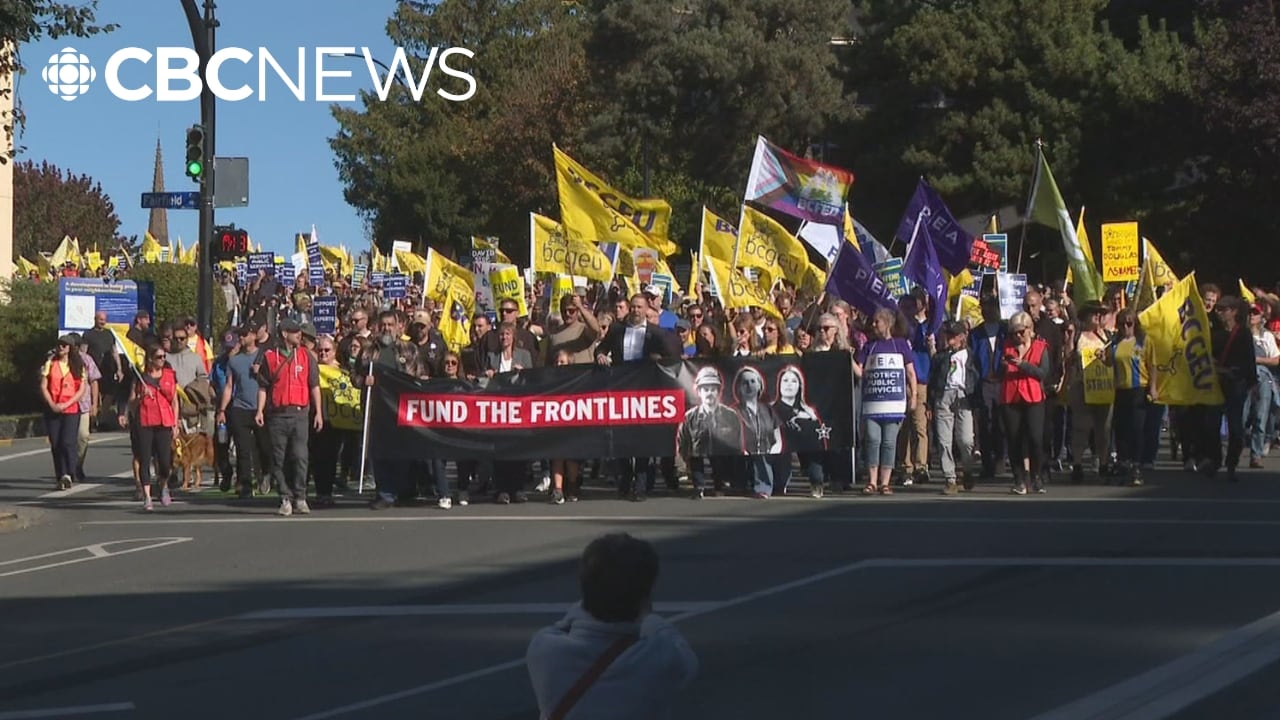 Striking BCGEU members march in Victoria as legislature opens
