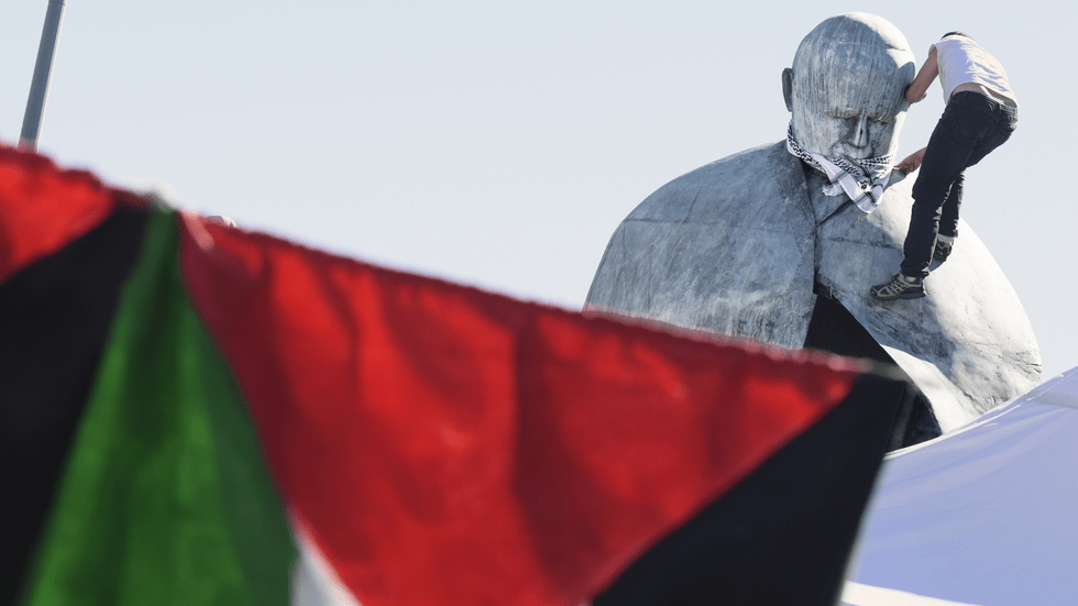 Pro-Palestine vandals deface Pope John Paul II statue in latest ...