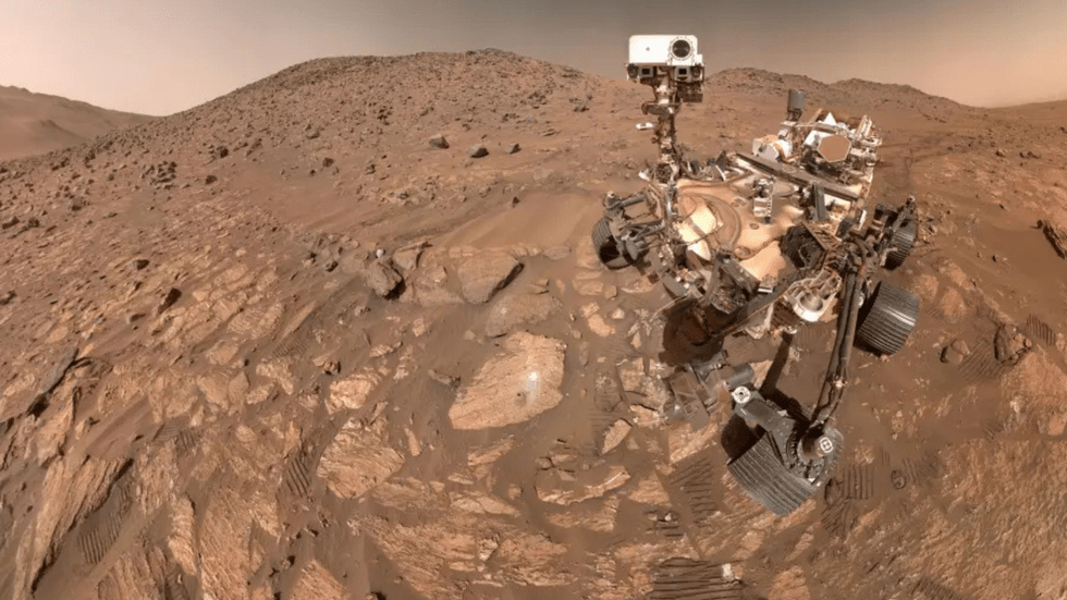 Mars rover investigates mysterious spots on planet's surface in ...