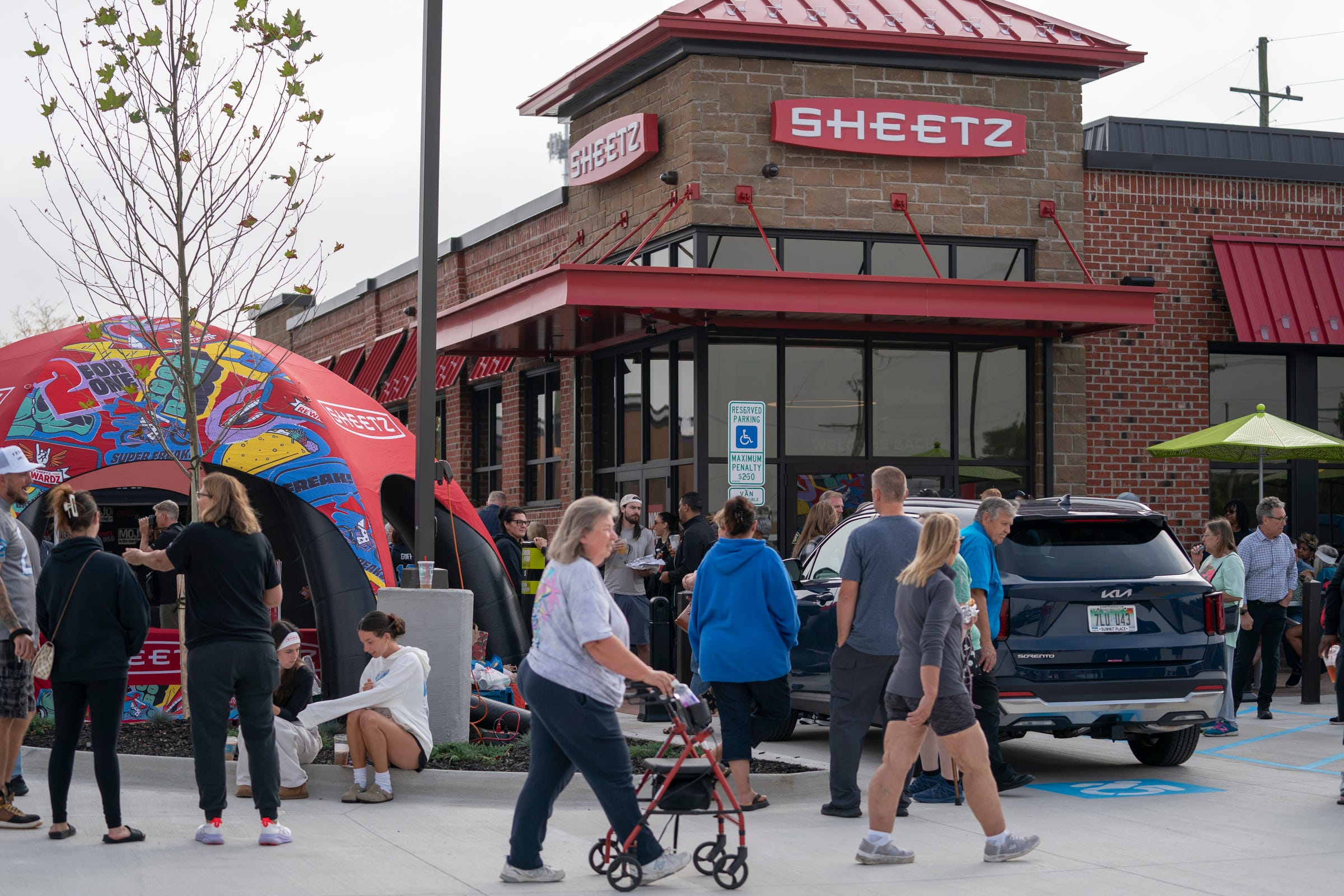 Third metro Detroit Sheetz gas station and convenience store cuts ribbon