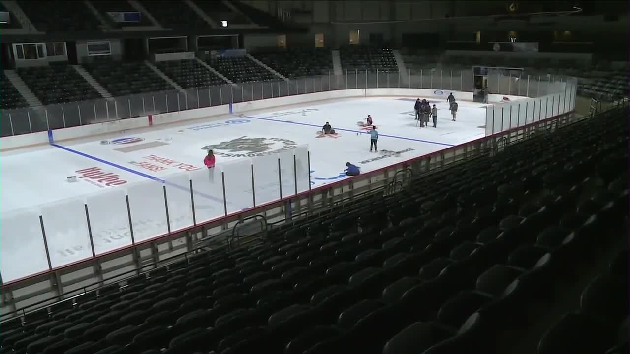 Community members etch their marks into home rink of Topeka Scarecrows ...