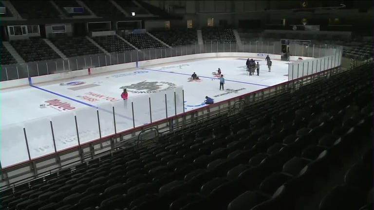 Community members etch their marks into home rink of Topeka Scarecrows ...