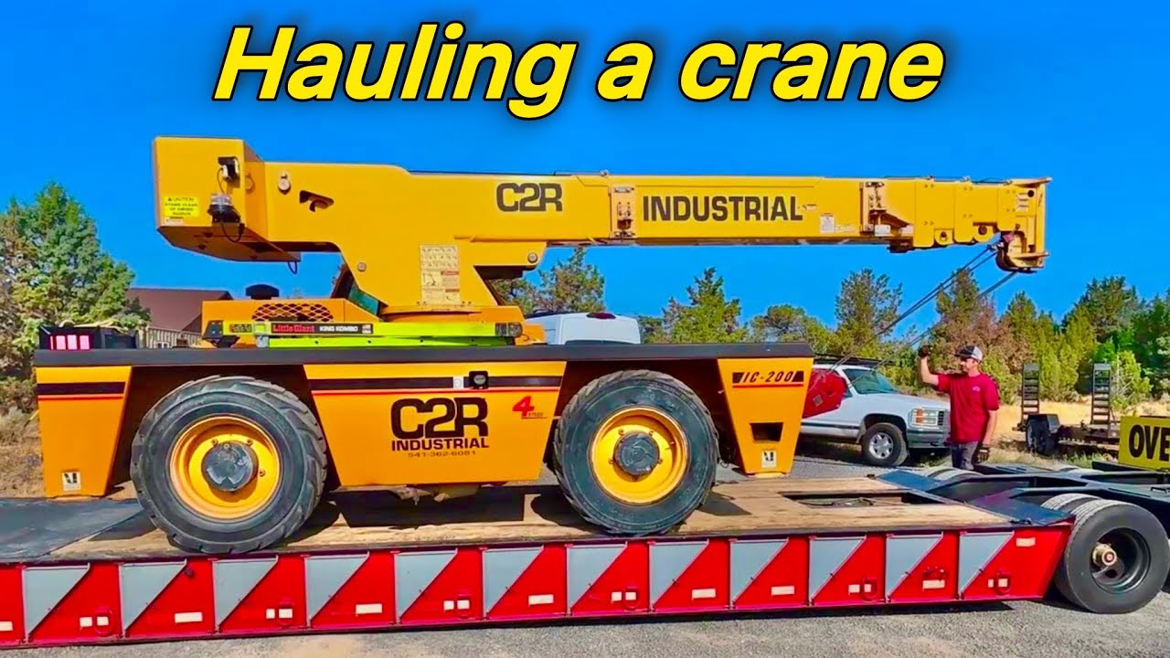 Hauling a carry deck crane