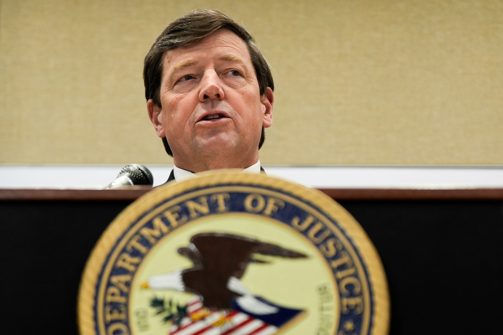 US Justice Department official questions retired FBI agent's role in $1 ...