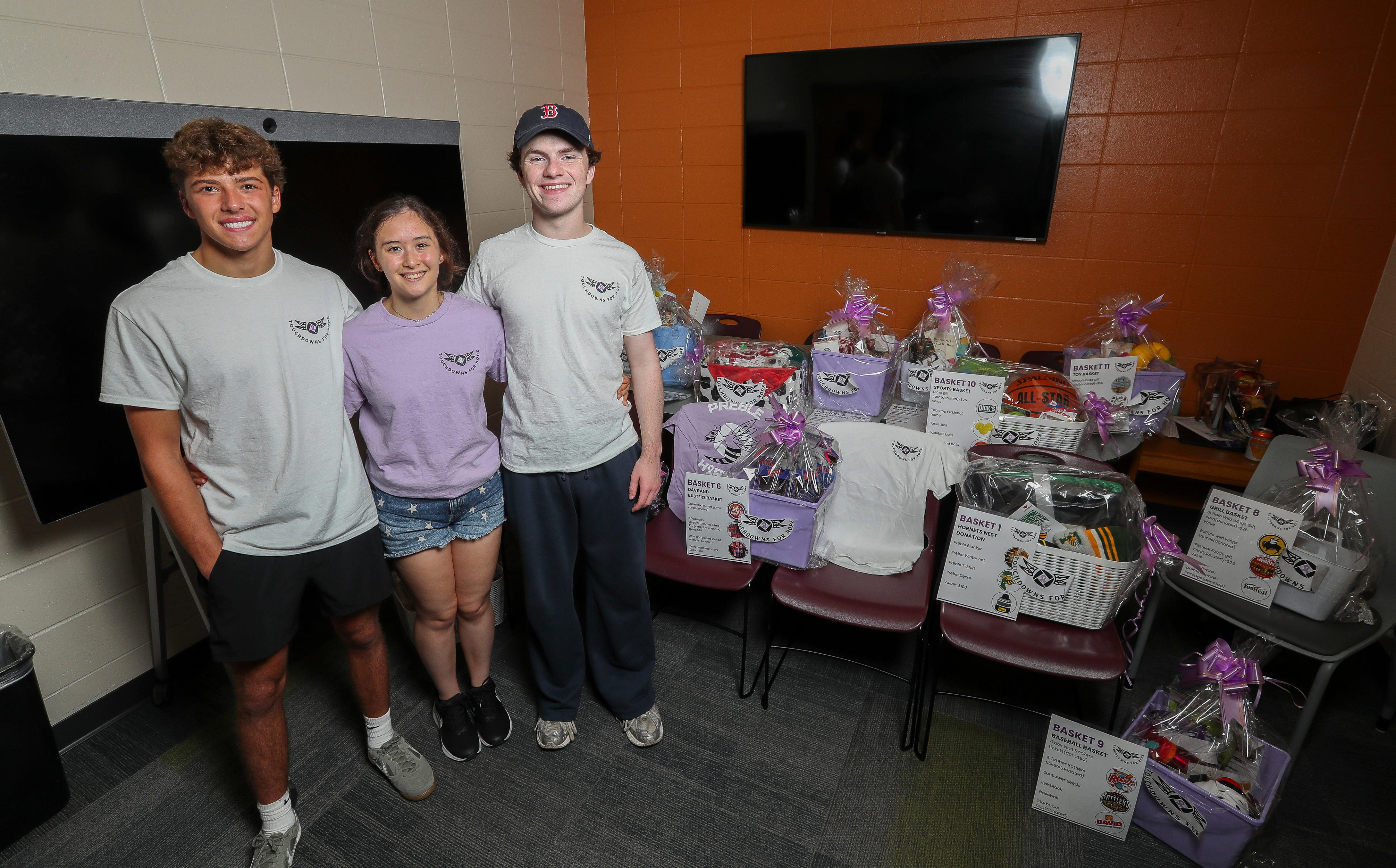 Preble students honor adviser with 'Touchdowns for Hope' cancer fundraiser