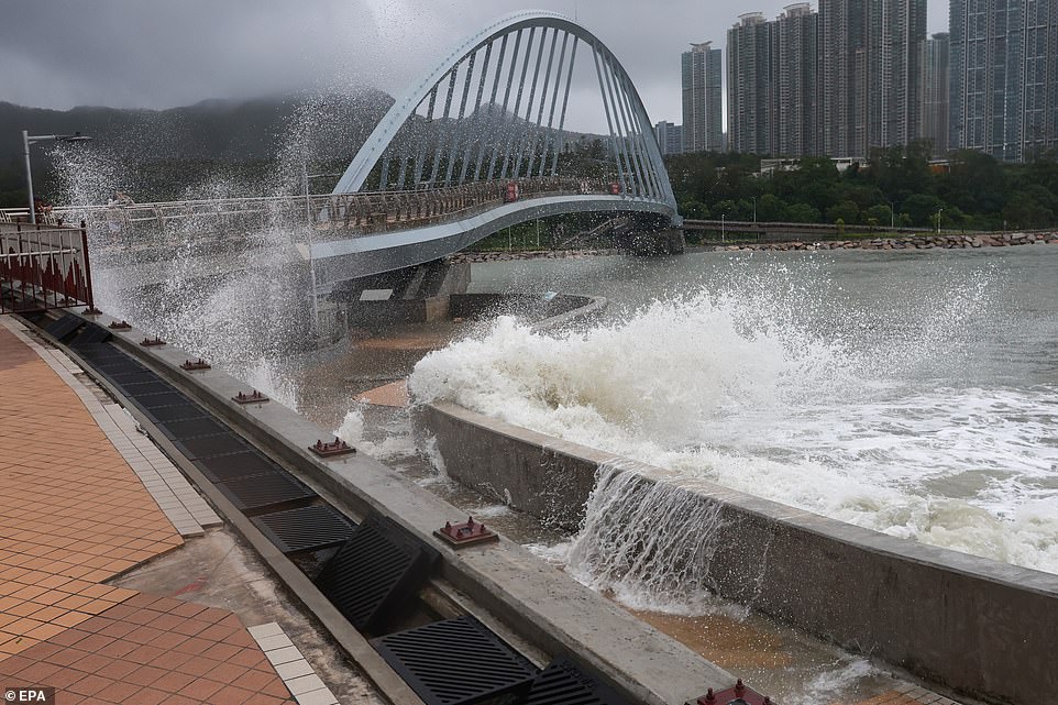 Hotel guests flee as Typhoon water smashes through wall in Hong Kong