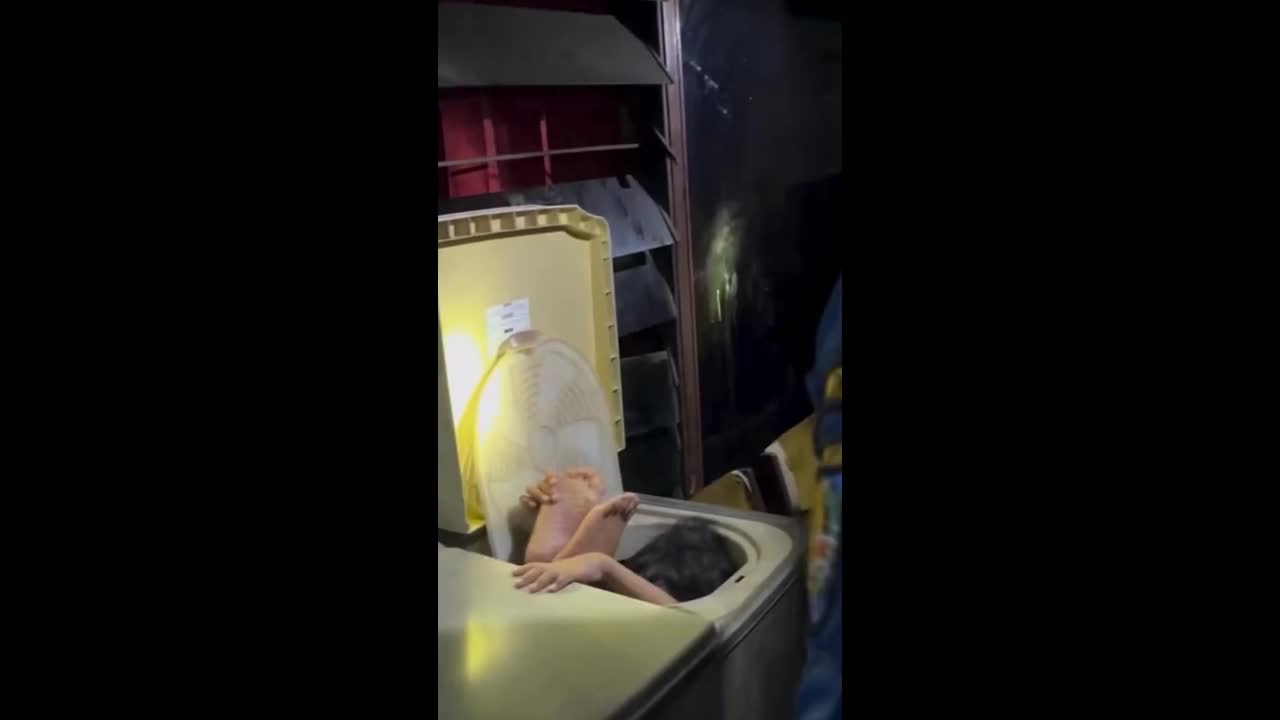 Firemen rescue terrified toddler stuck in washing machine