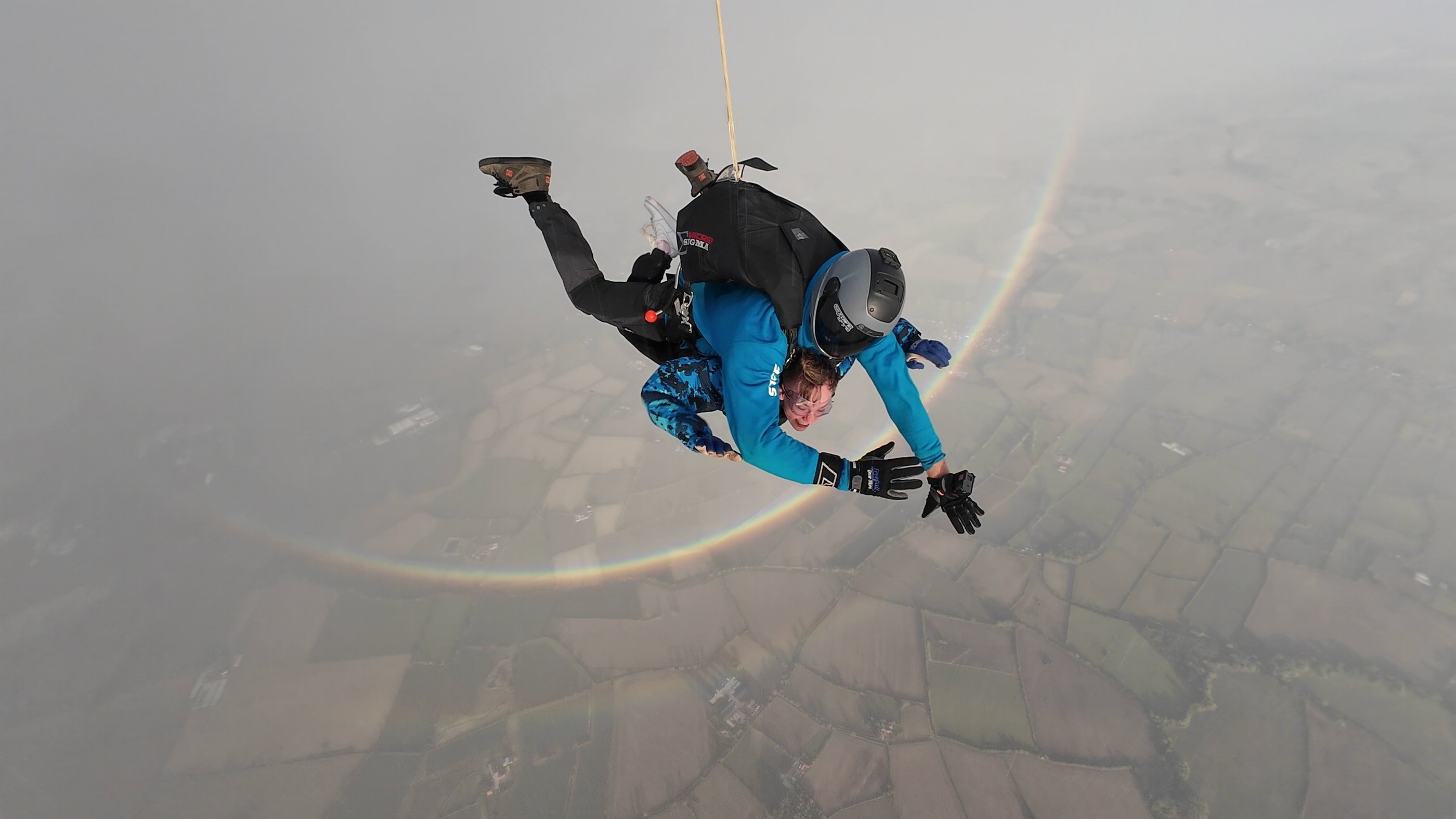 Amazing rare circular rainbow captured by "awestruck" skydivers