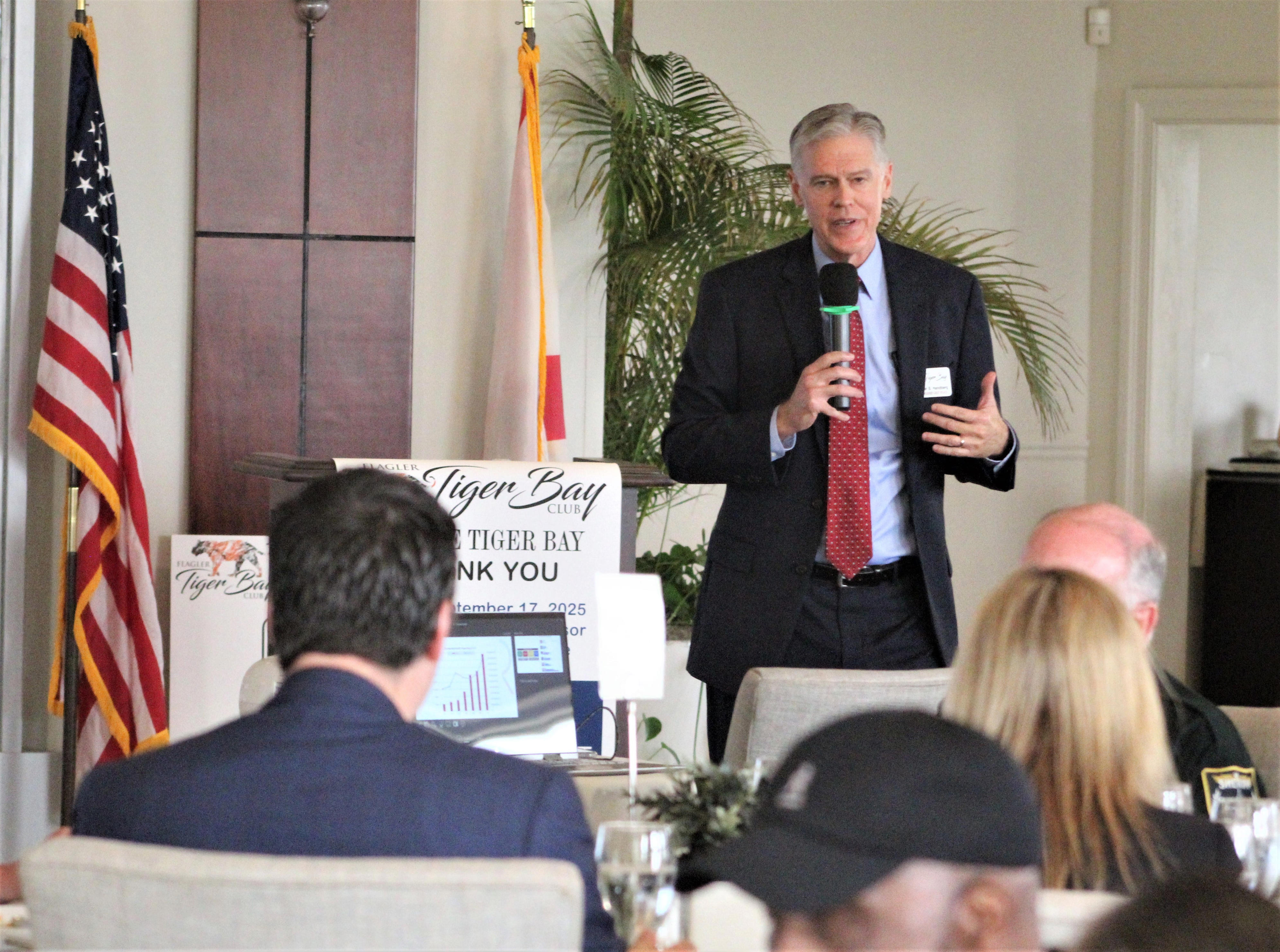 Former U.S. Attorney Roger Handberg speaks to the Flagler Tiger Bay ...