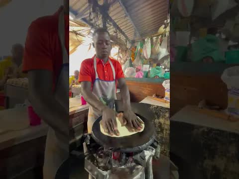 kenyan bread master making street food flatbread