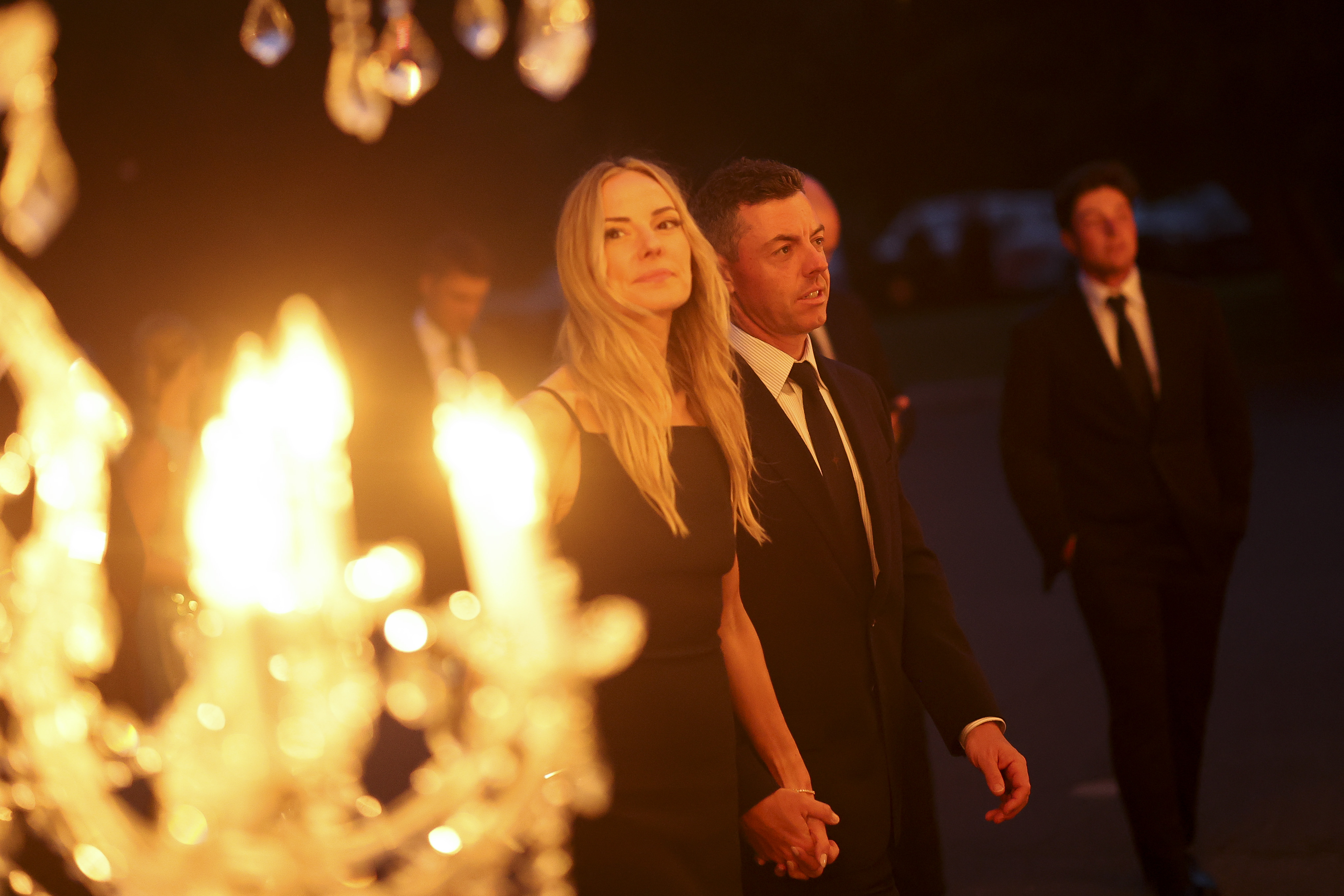 Rory McIlroy and wife Erica Stoll hold hands during Ryder Cup gala ...