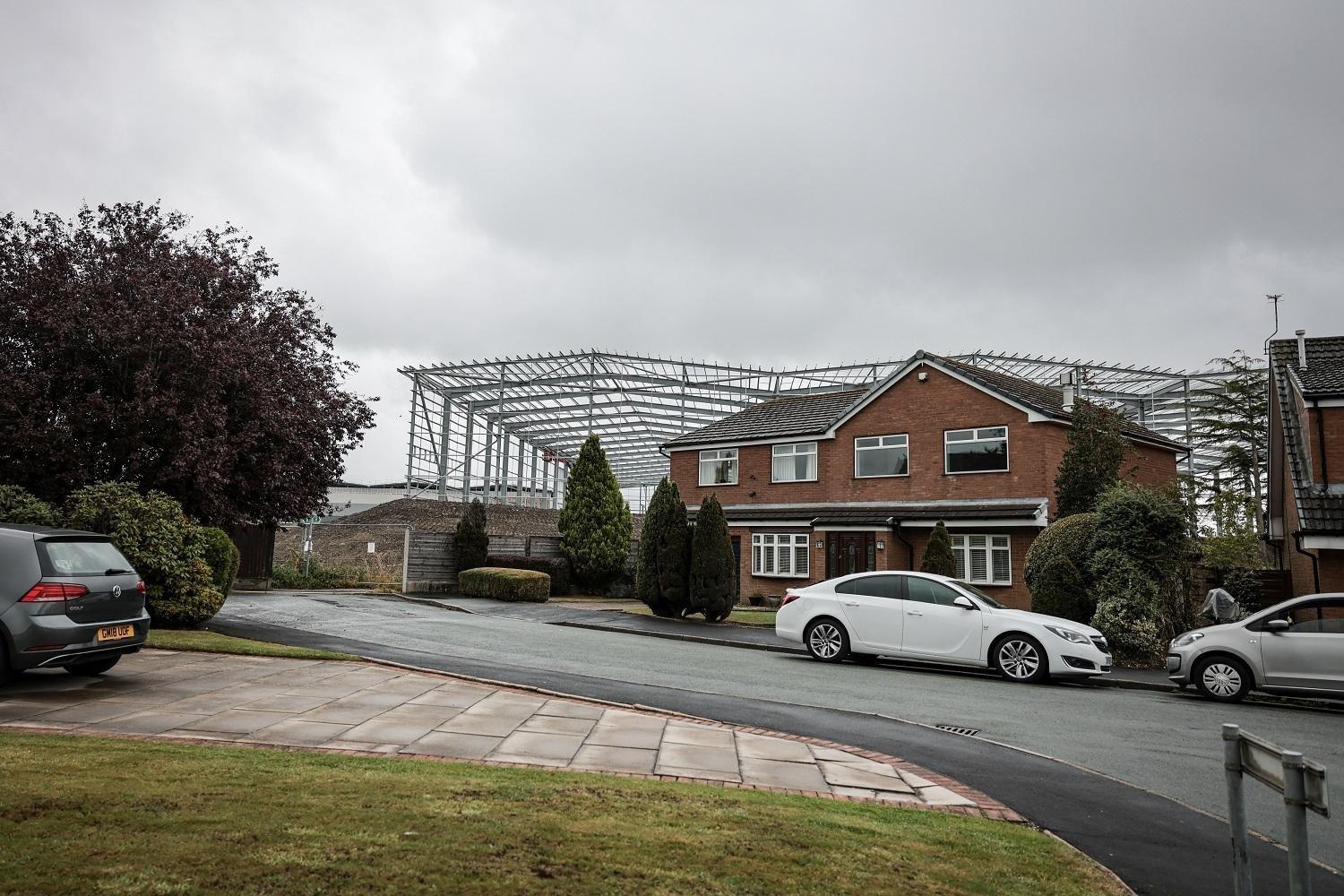 Mayor Andy Burnham steps into Wigan borough ‘cruise liner’ warehouses row