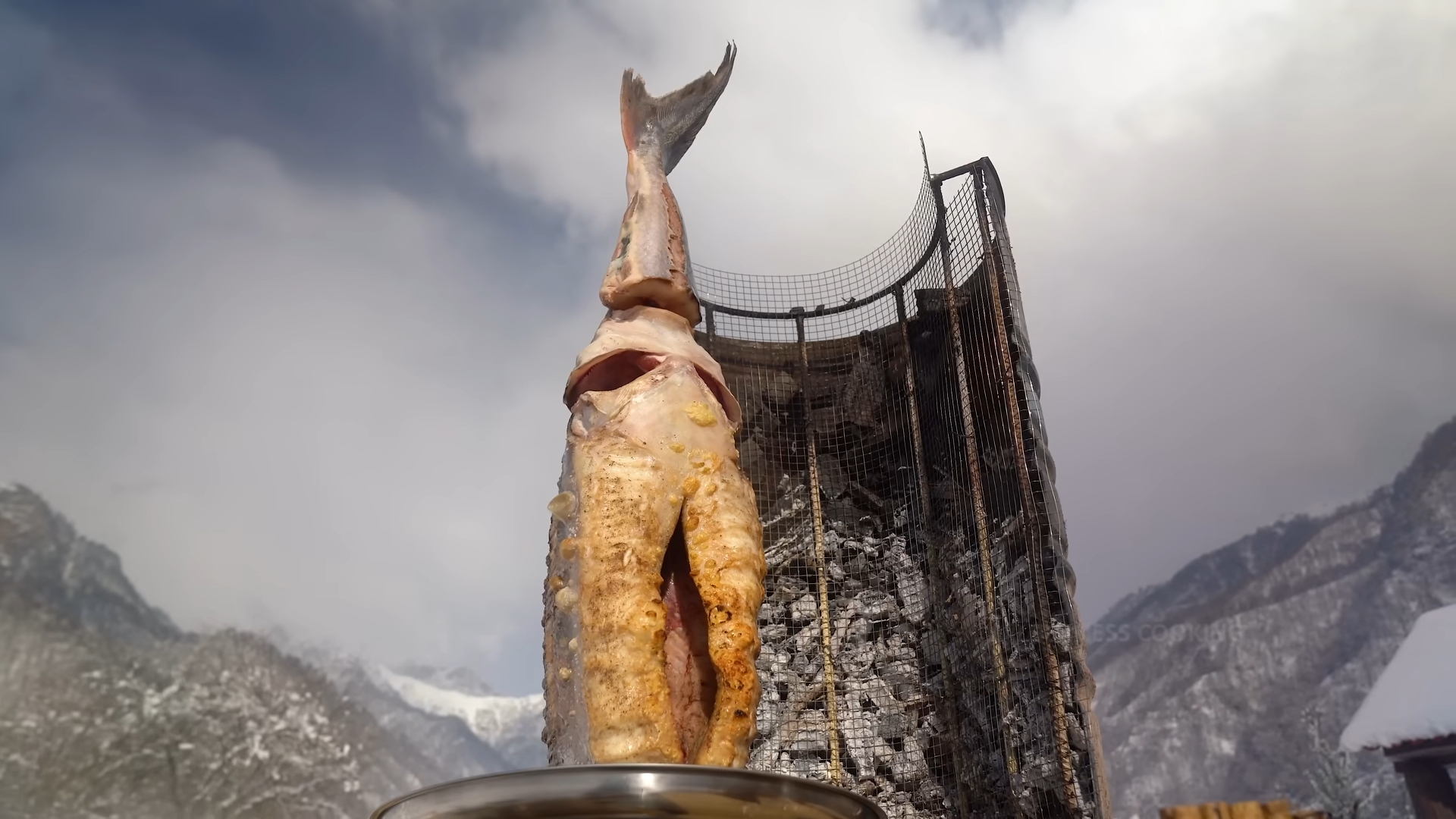 How a giant sturgeon is grilled in a harsh Azerbaijani winter