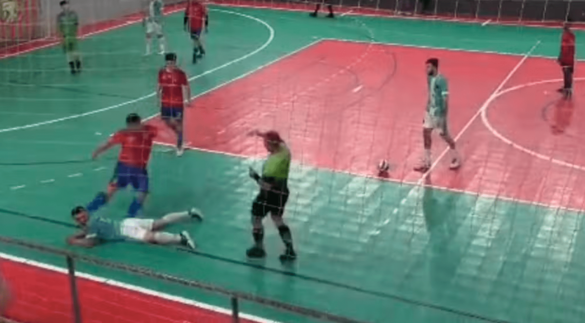 Futsal player kicks rival in head before violent brawl