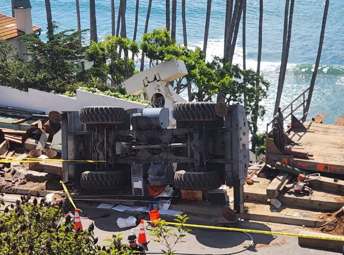 Overturned construction crane blocks traffic in Malibu