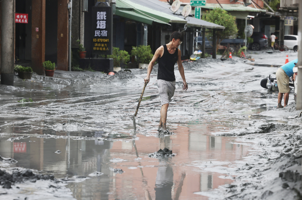 'No warning' - residents reel from deadly flood after typhoon bursts ...