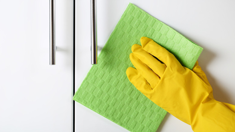 This Kitchen Cabinet Cleaning Tip Using An Orange Works 'Like Magic'