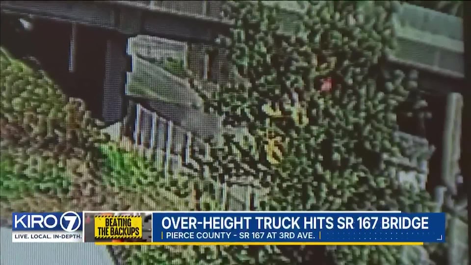 VIDEO: Over-height truck hits SR 167 bridge