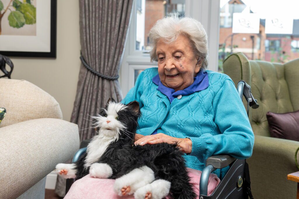 Care home residents given robot pets to tackle loneliness