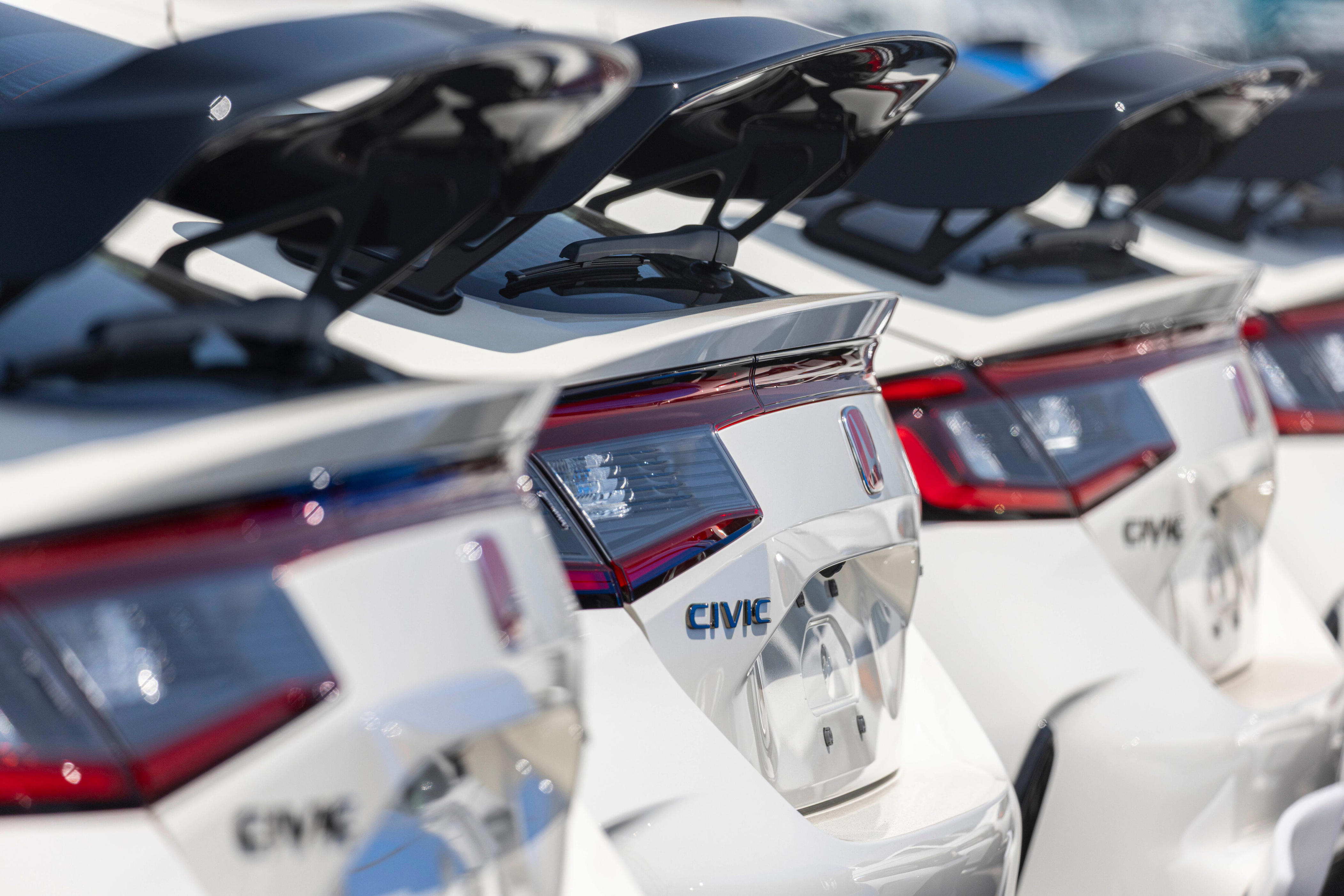 Automakers are tapping the brakes on the EV revolution. Here are all ...
