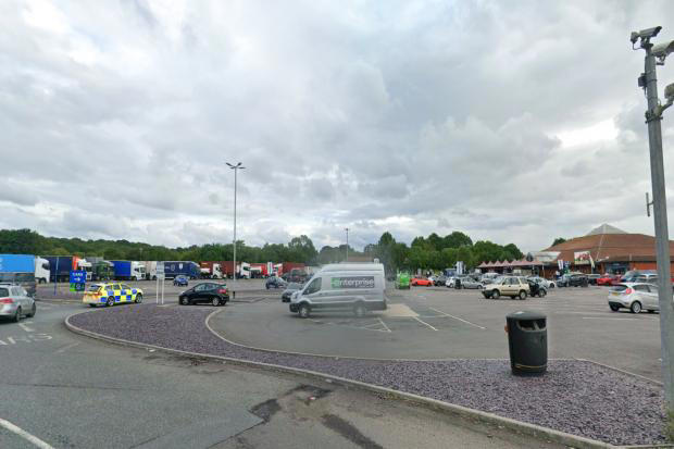Biker attacked before van drives into him at M4 service station