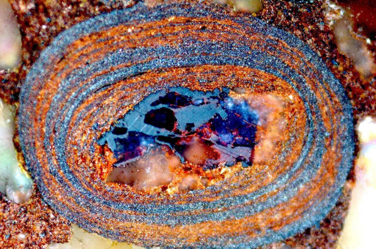 Tiny iron oxide stones reveal Earth's ancient oceans were carbon-poor ...