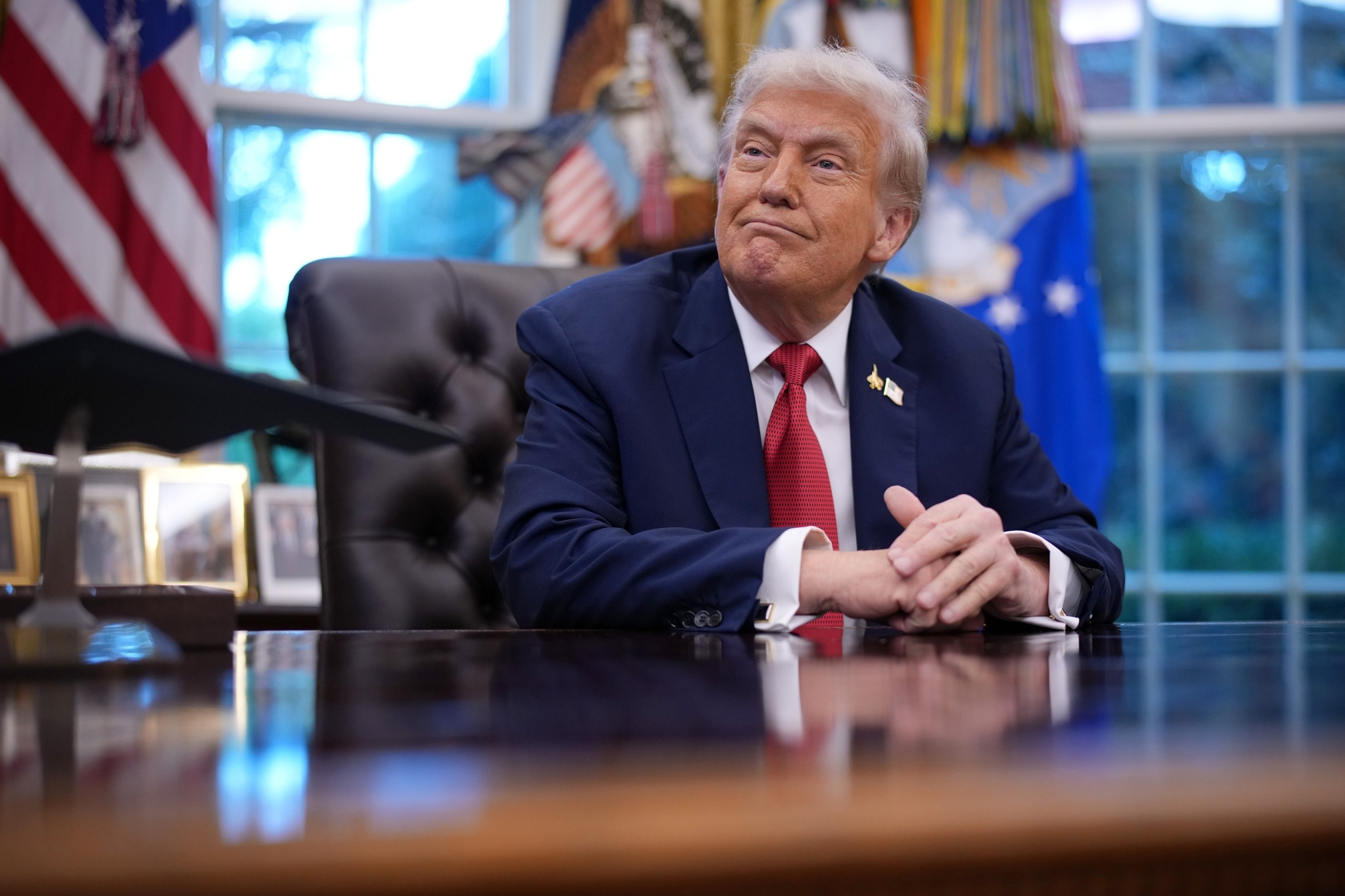 Trump announces deal to put TikTok under control of US investors