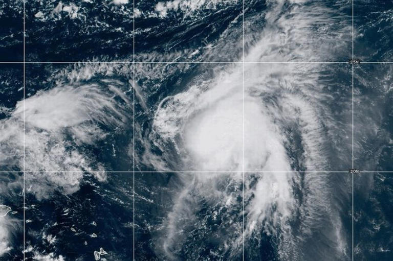 Two tropical cyclones to merge into monster storm — triggering rare ...