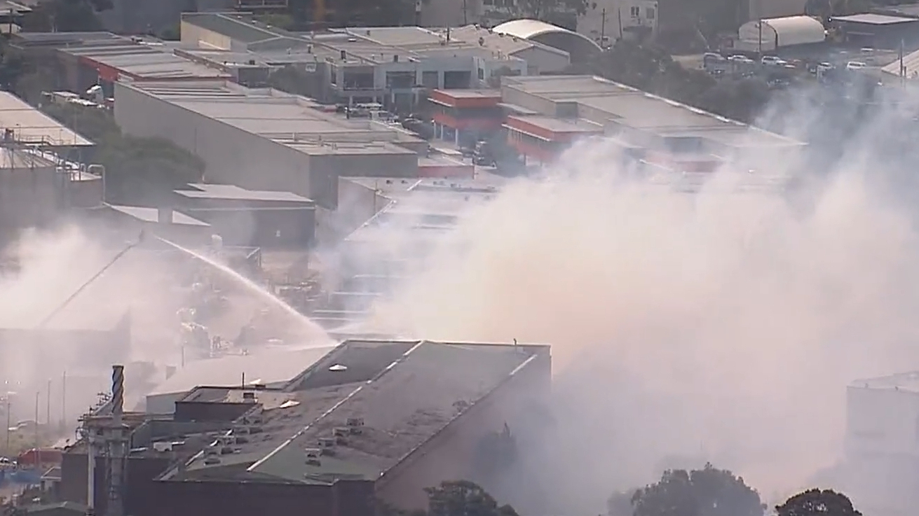 Firefighters battle paper storage facility blaze the size of two ...