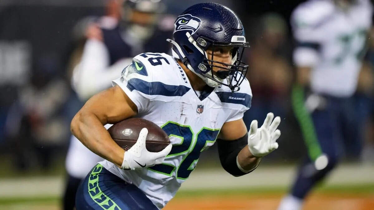 NFL star Zach Charbonnet's net worth in 2025: Current salary, rookie ...