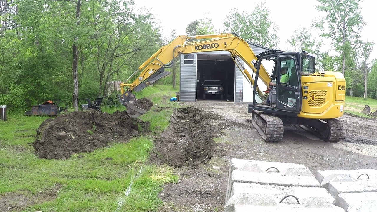 Excavating, Compacting & Retaining Wall Prep for New Driveway