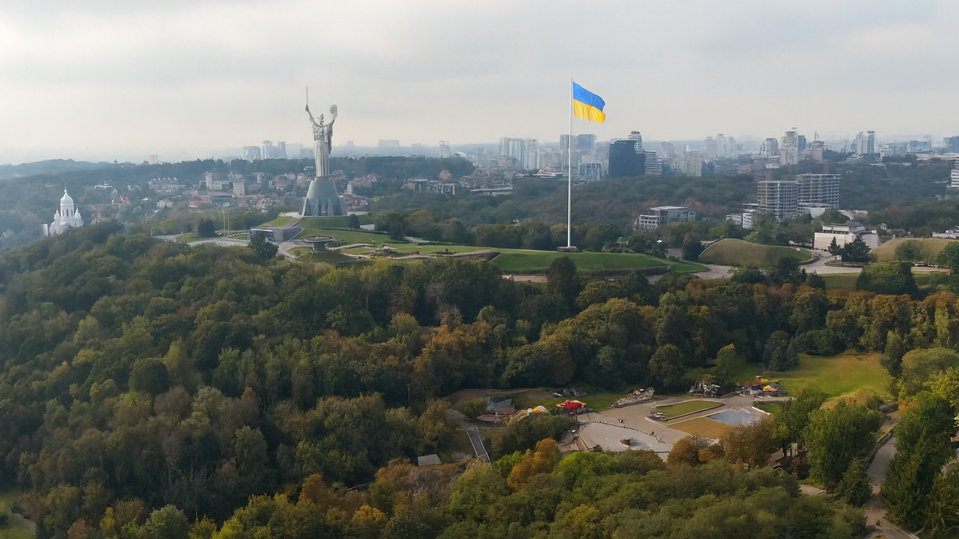 Motherland Monument Kyiv Ukraine – City View and National Flag in 4K