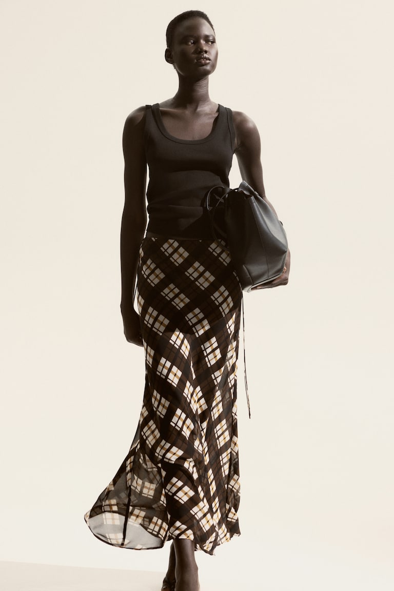 It's Time to Retire Your Summer Skirts—Plaid Midis are Our Autumn Essential