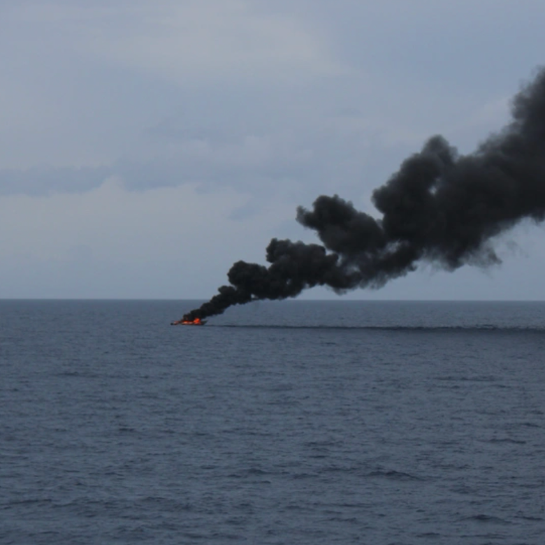 Coast Guard releases image of alleged drug boat on fire after seizures