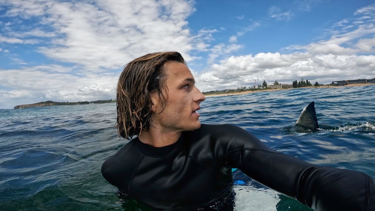 Surfing a scary reef break over shallow water