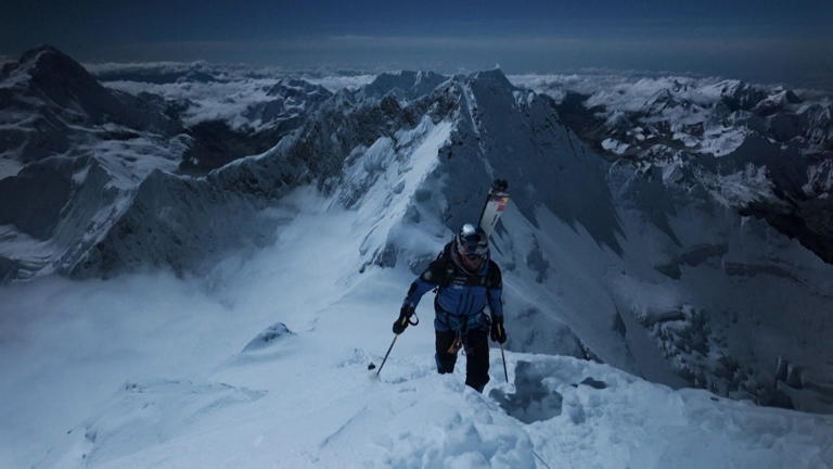 Watch Polish man make history by skiing down Mount Everest without an ...
