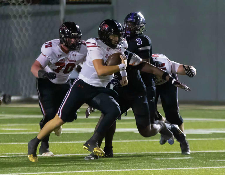 High school football: Lake Travis roars back to pound Bowie in 26-6A