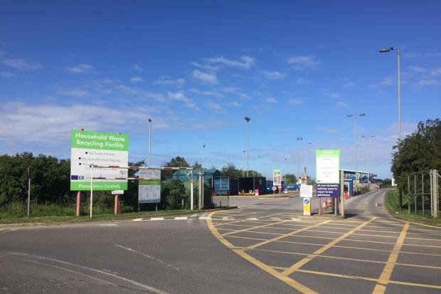 Crane operator found body of man at recycling centre, inquest hears