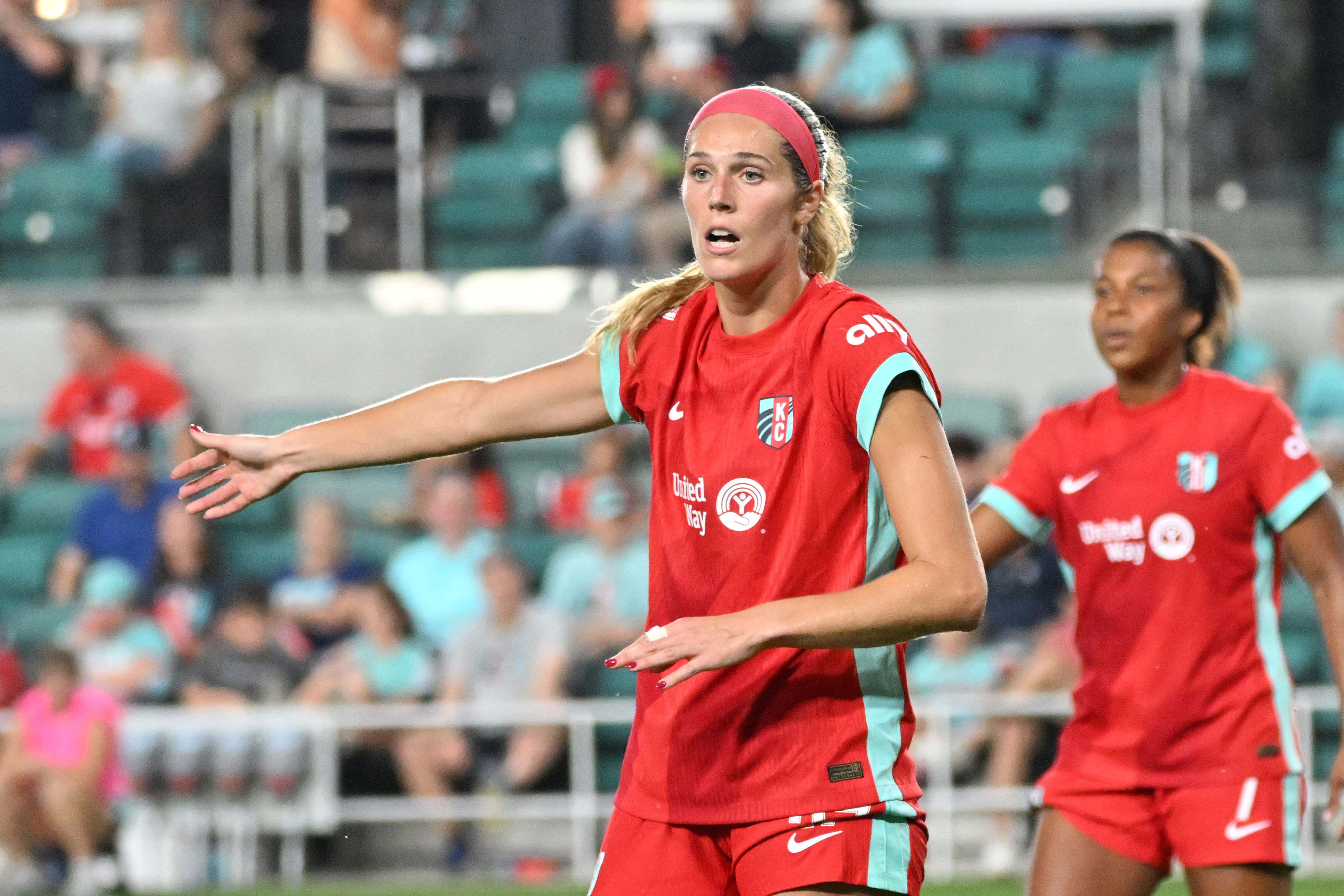 KC Current’s Hailie Mace (lower leg) and Kayla Sharples (lower leg ...