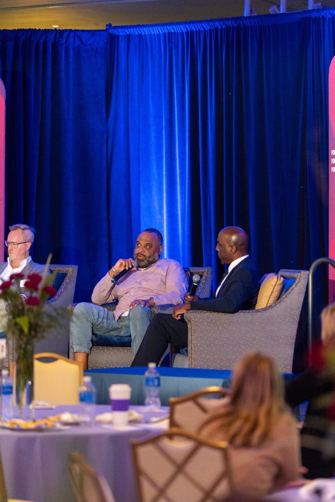 Hundreds gather at symposium emceed by 8News’ own Eric Philips to ...