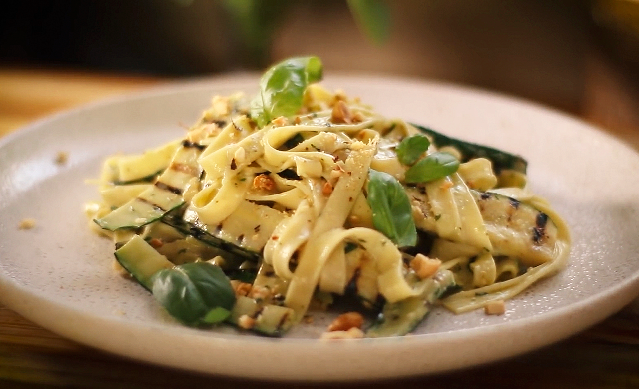 Hazelnut basil pesto pasta with charred zucchini