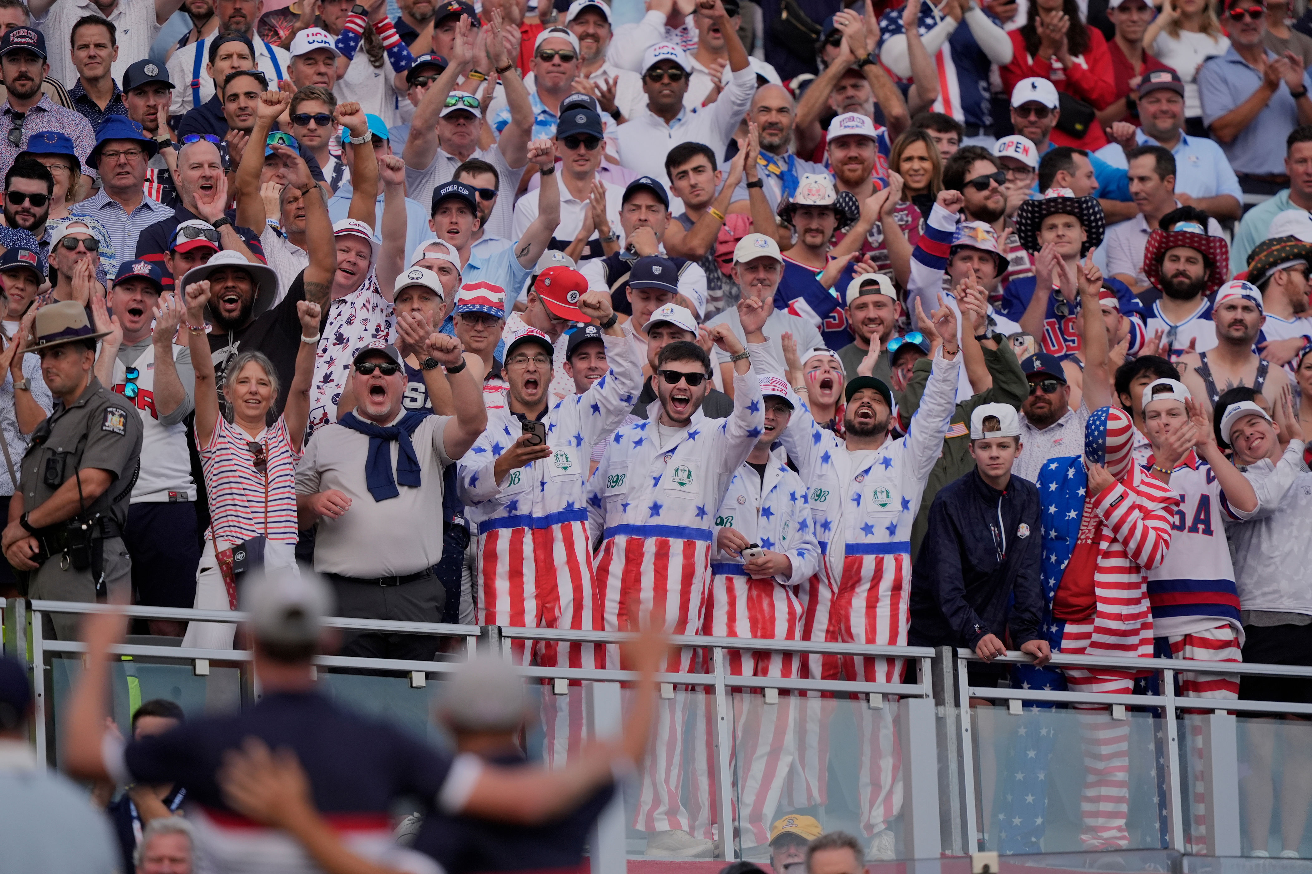 U.S. fans get loud while U.S. golfers mostly quiet as Ryder Cup opens