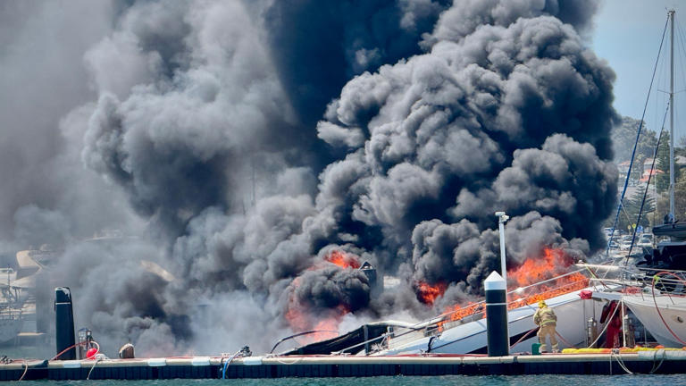 Firefighters battling boat fire at Hillarys Boat Harbour