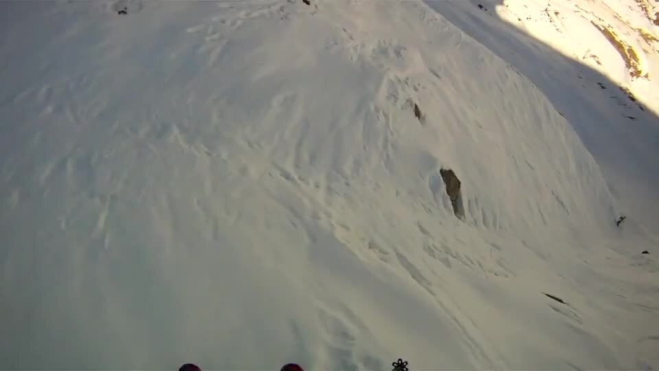 Skier Tries to Go Down Steep Mountain