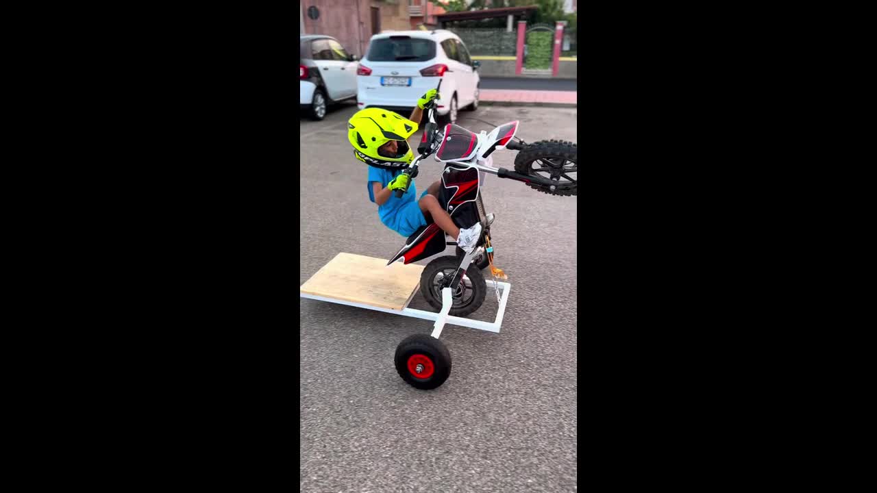 Child performs first supported wheelie on dirt bike in Sardegna, Italy