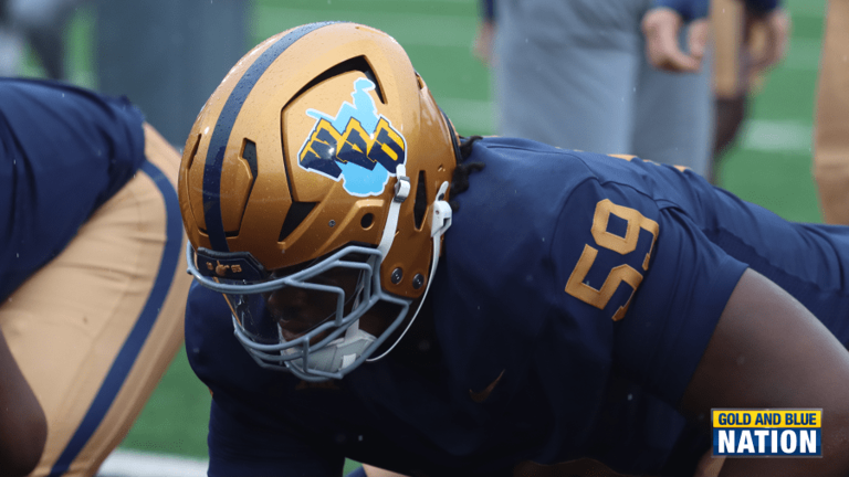 PHOTOS: WVU football debuts 1965 throwback uniform