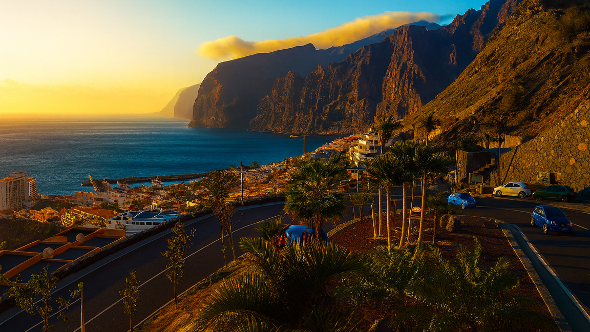 Golden Sunset Over Ocean Cliffs – Coastal Town in 4K